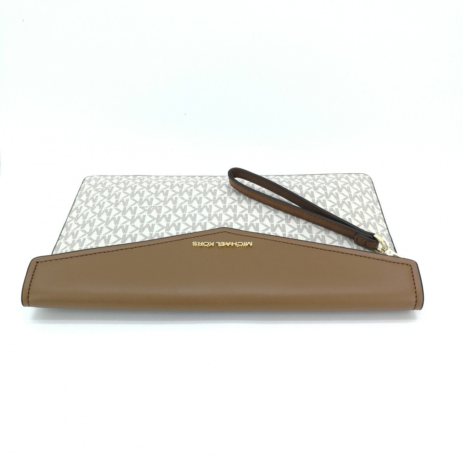 Clutch MICHAEL KORS en piel y lona Monogram de segunda mano.