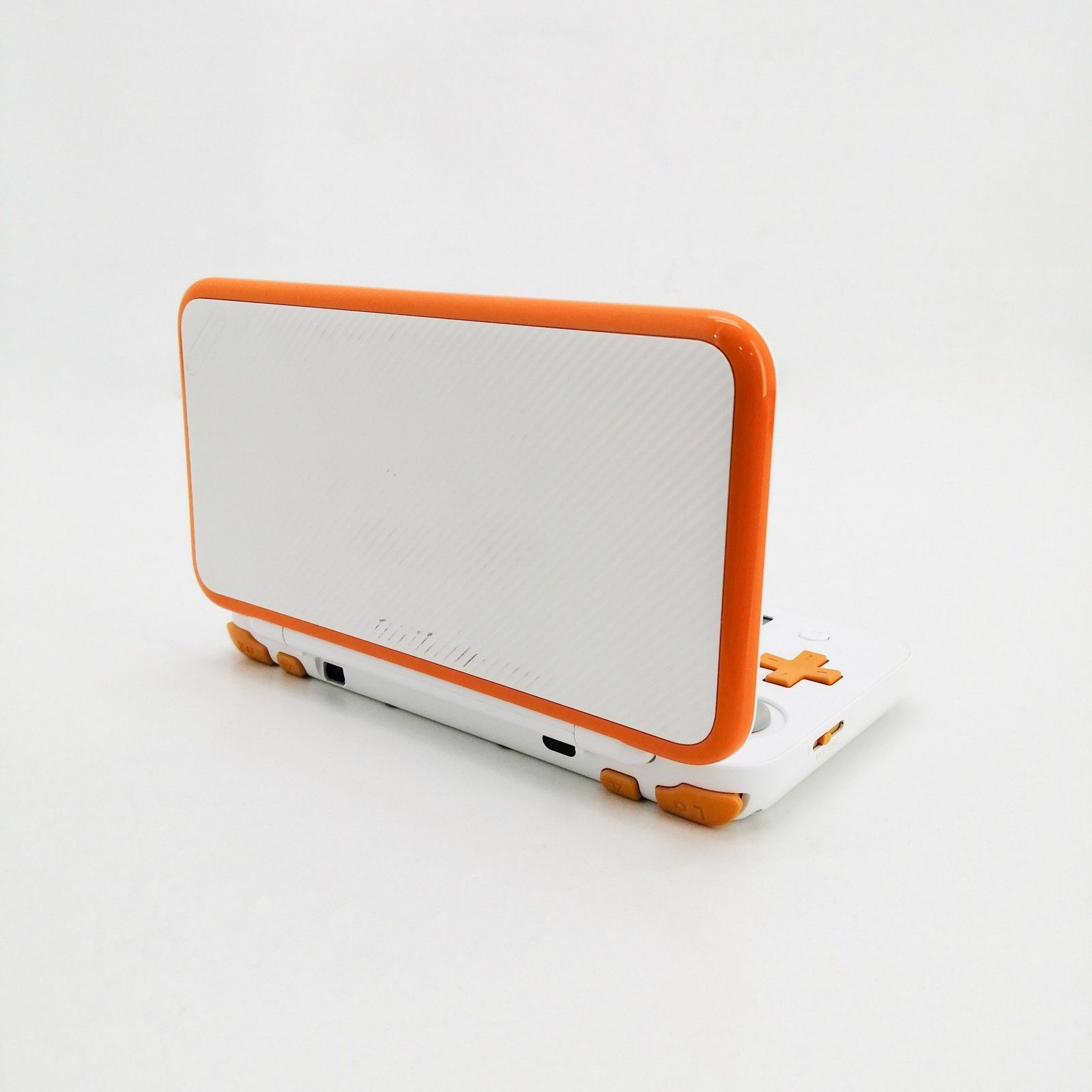 Consola New Nintendo 2DS XL blanco y naranja de segunda mano